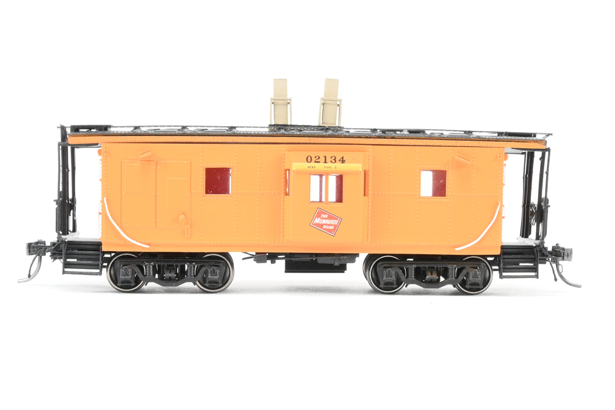 HO CON Lines West MILW - Milwaukee Road Thrall Bay Window Caboose Cust – ReSourced Rails